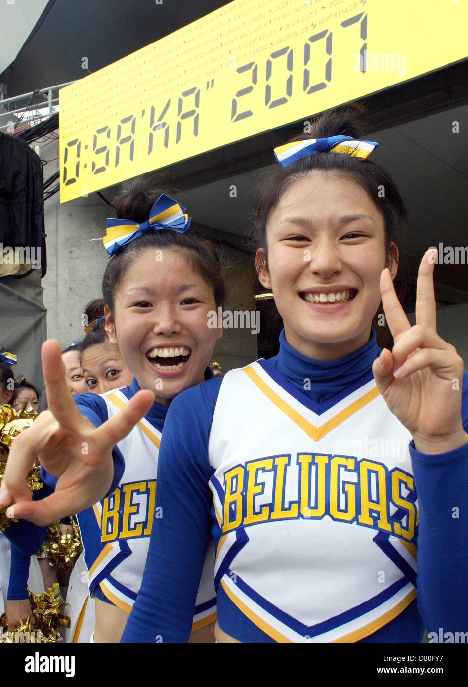 Japanese cheerleaders laugh during final hi-res stock photography and ...