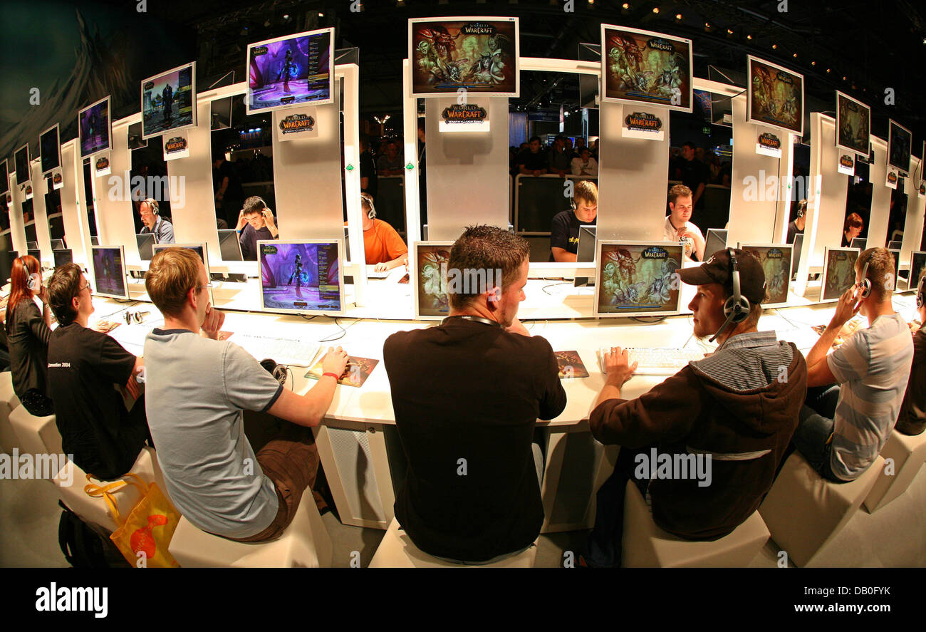 Visitors play computer games at the Blizzard stand of Europe's biggest ...