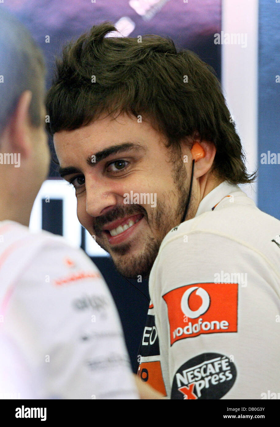 Spanish Formula One pilot Fernando Alonso of McLaren Mercedes smiles in ...
