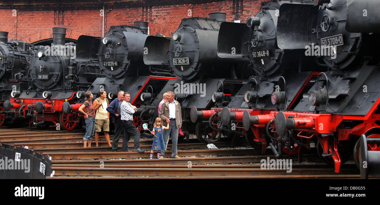 Visitors to the biggest German steam engine convention admire the fully ...