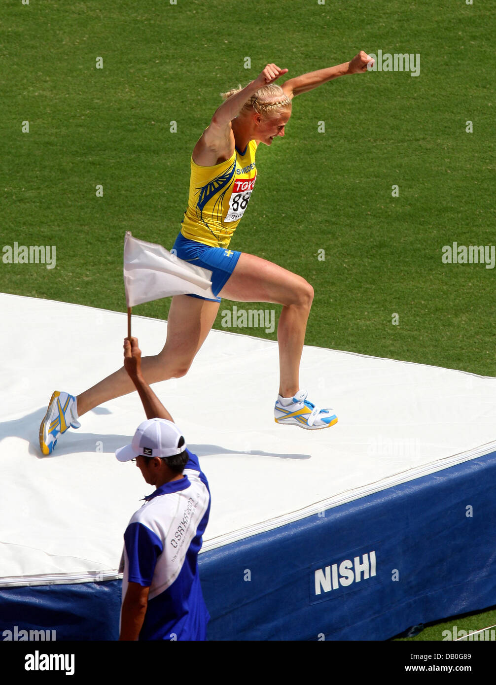 Swedish heptathlete Carolina Klueft cheers her personal best of 1.95 ...