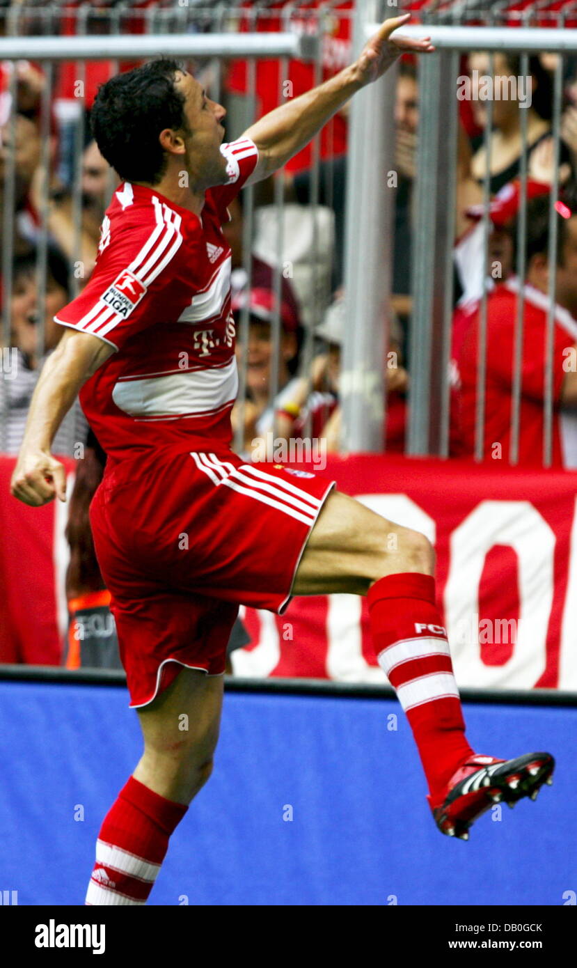 Mark van Bommel of Munich celebrates scoring the 2-0 during the ...