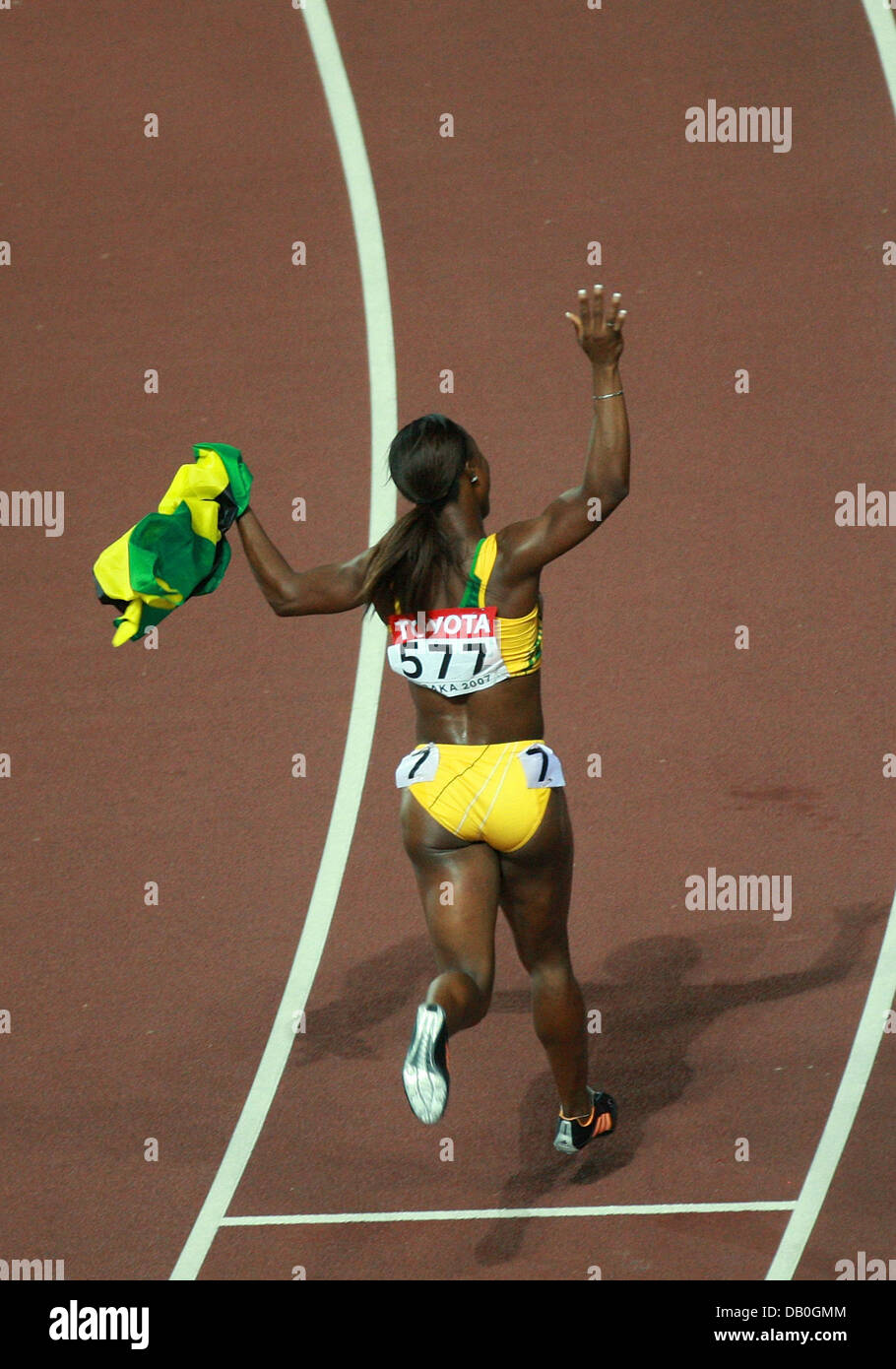 The picture shows Jamaican athlete Veronica Campbell cheering after ...