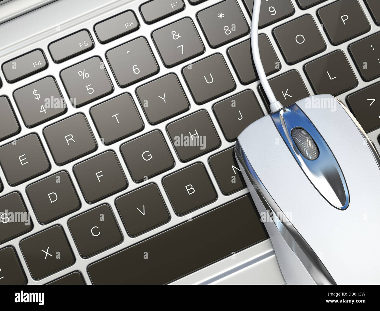 Computer mouse on laptop keyboard. Three-dimensioanl close-up image ...