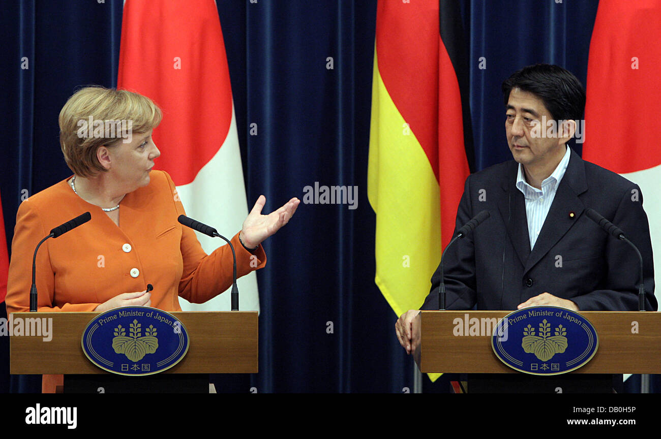 German Chancellor Angela Merkel and Japanese Prime Minister Shinzo Abe ...