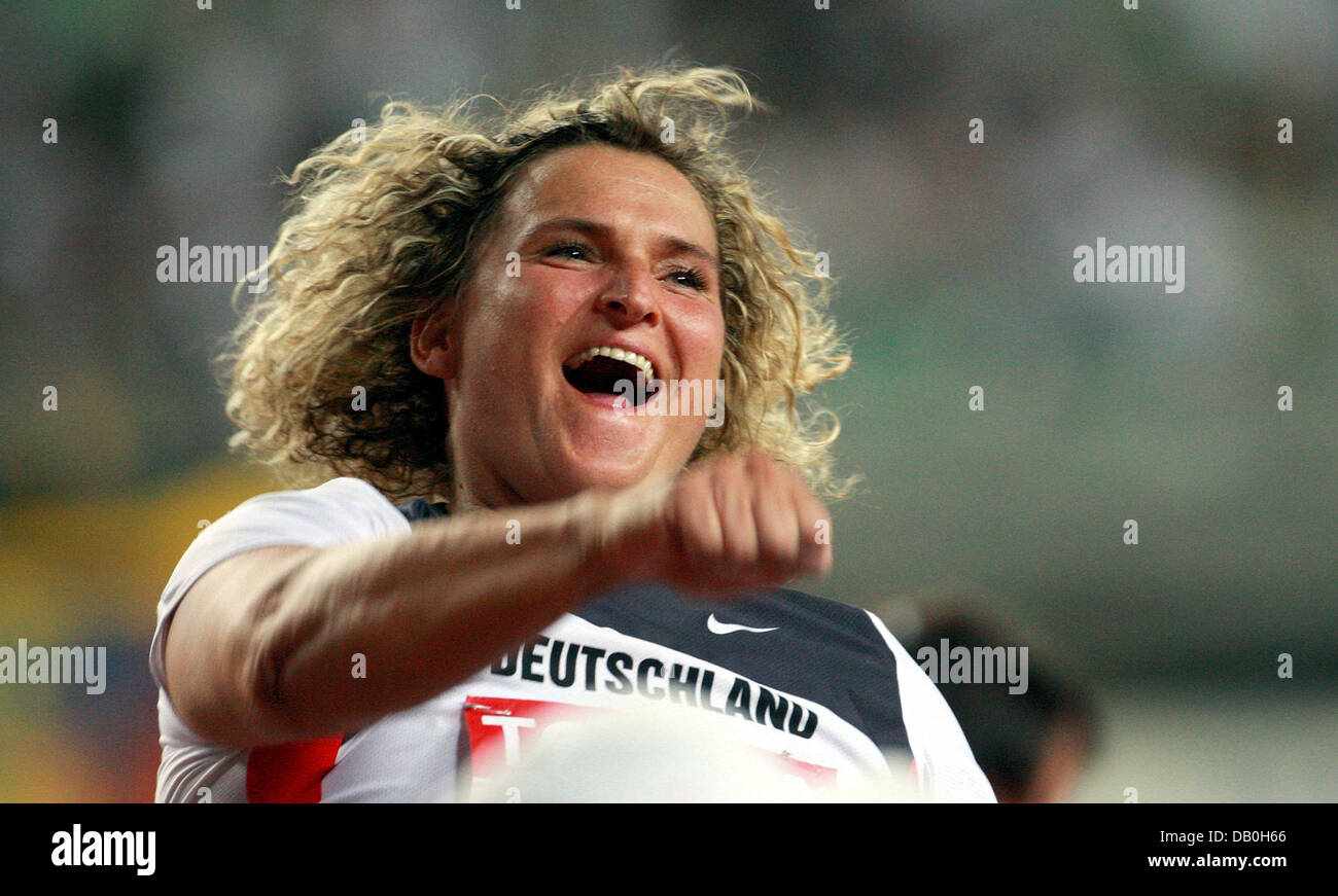German Franka Dietzsch cheers after her victory in the Women Discus ...