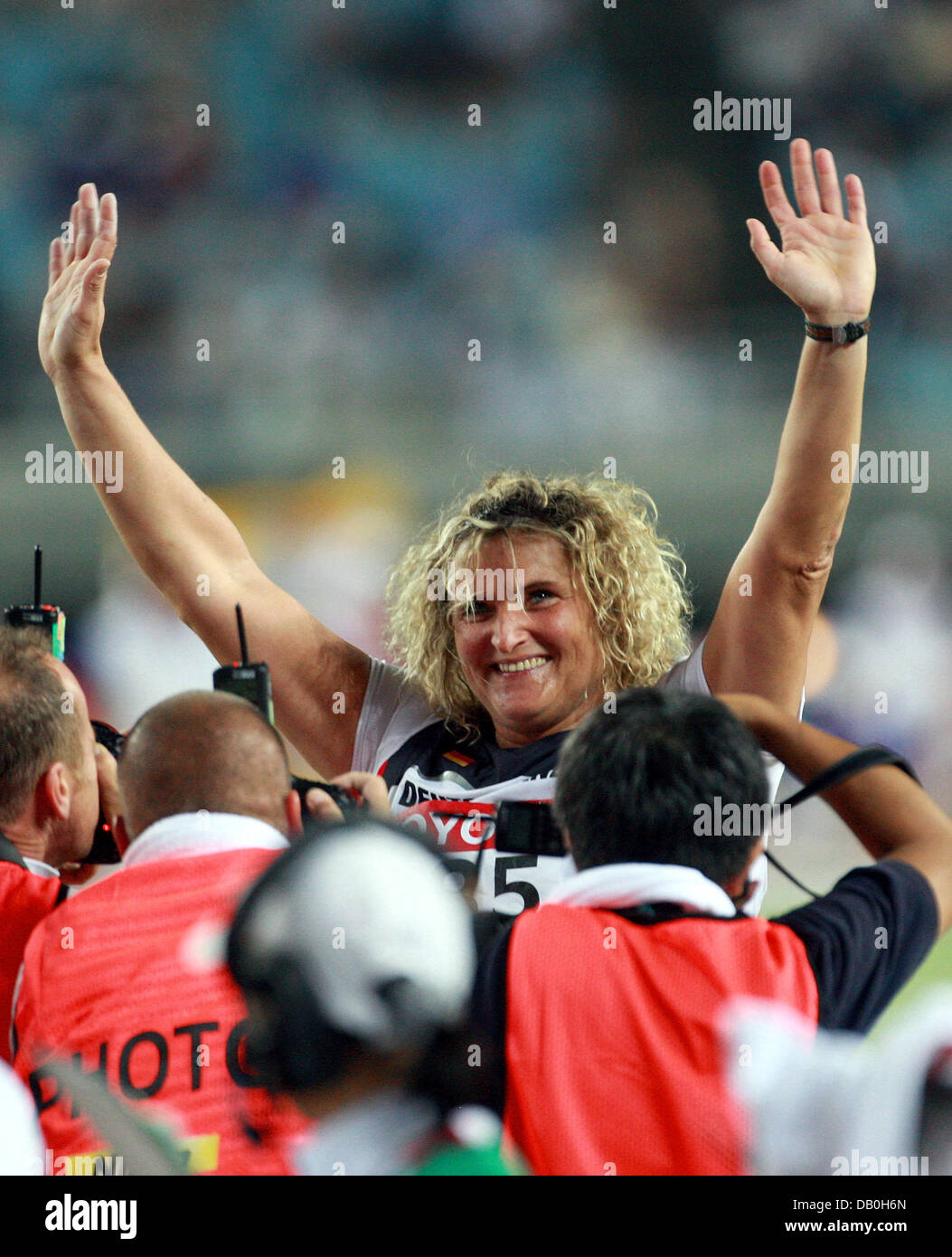 German Franka Dietzsch cheers after her victory in the Women Discus ...
