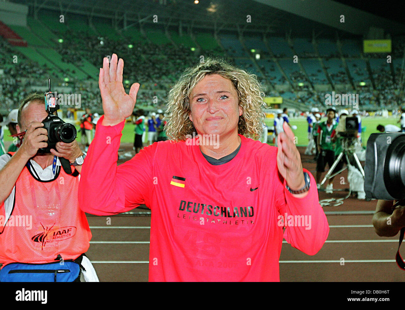 German Franka Dietzsch cheers after her victory in the Women Discus ...