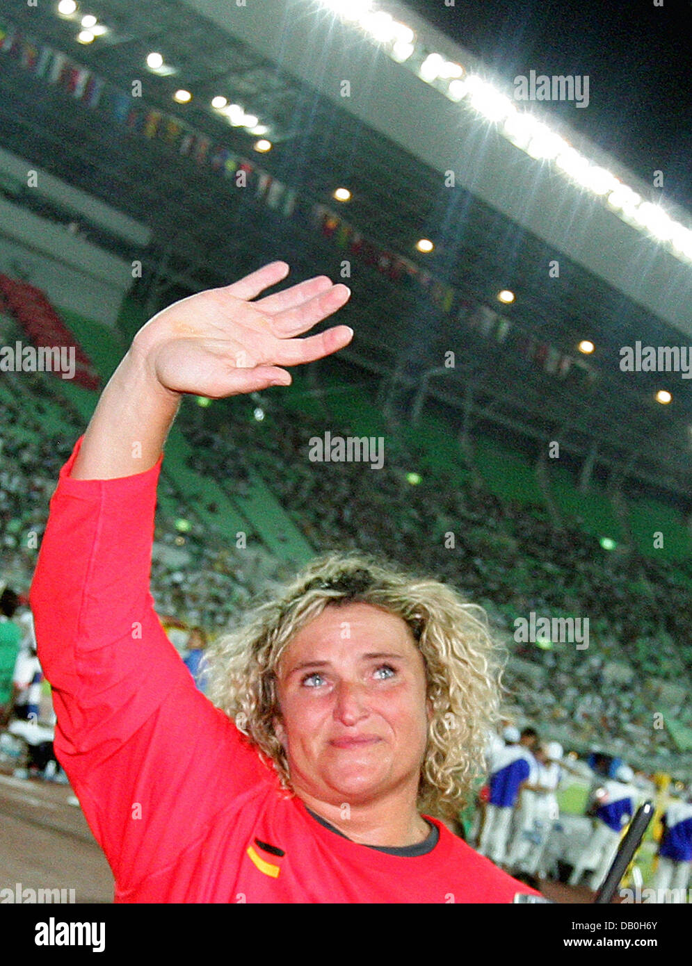 German Franka Dietzsch cheers after her victory in the Women Discus ...