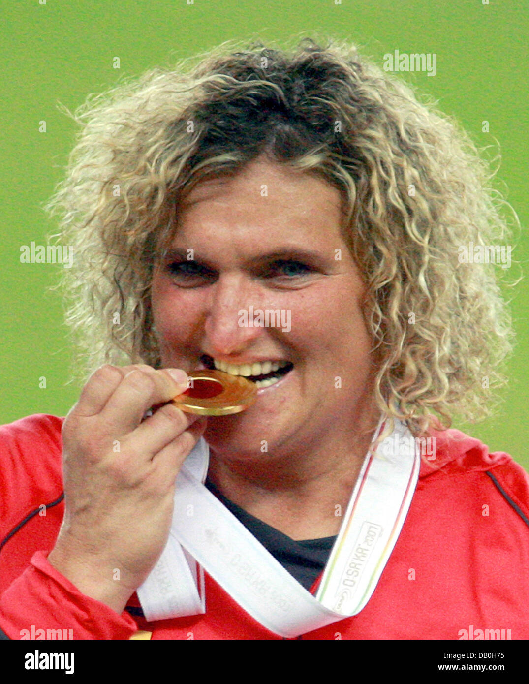 German Franka Dietzsch poses with her gold medal after her victory in ...