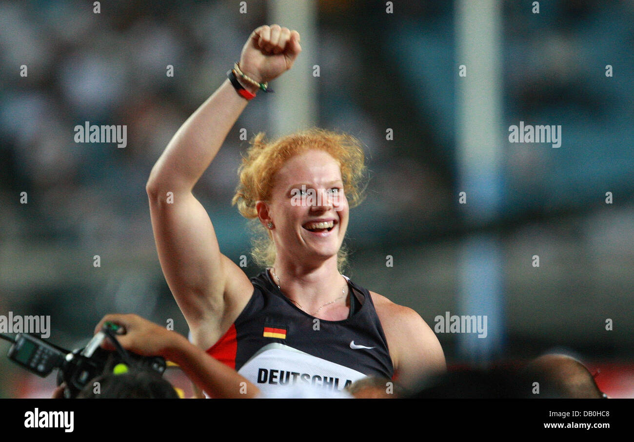 German hammer thrower Betty Heidler celebrates after winning gold in ...