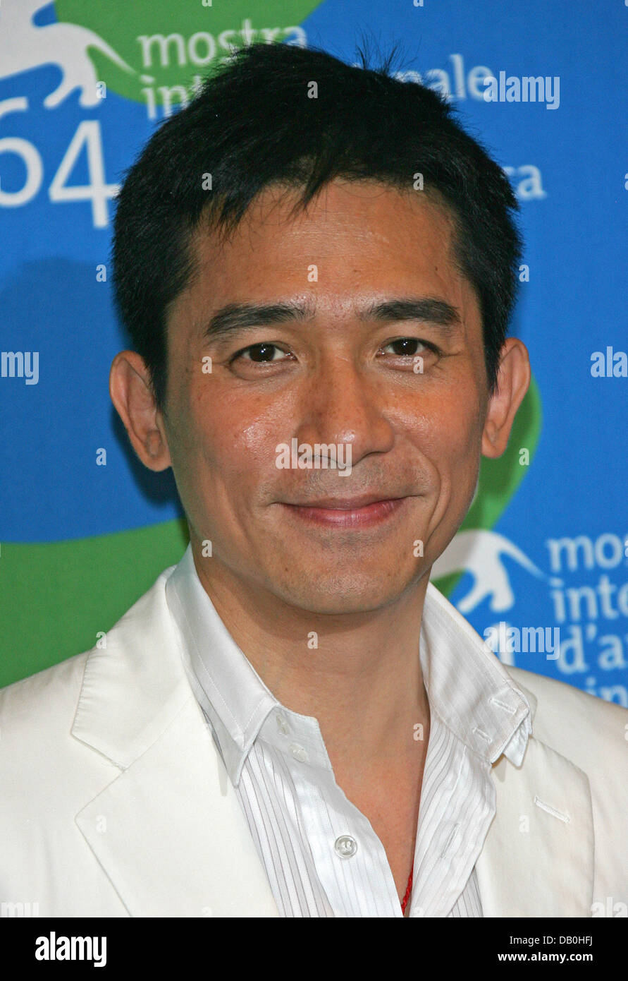 Actor Tony Leung Smiles At The Photocall For The Film Lust Caution During The 64th Venice