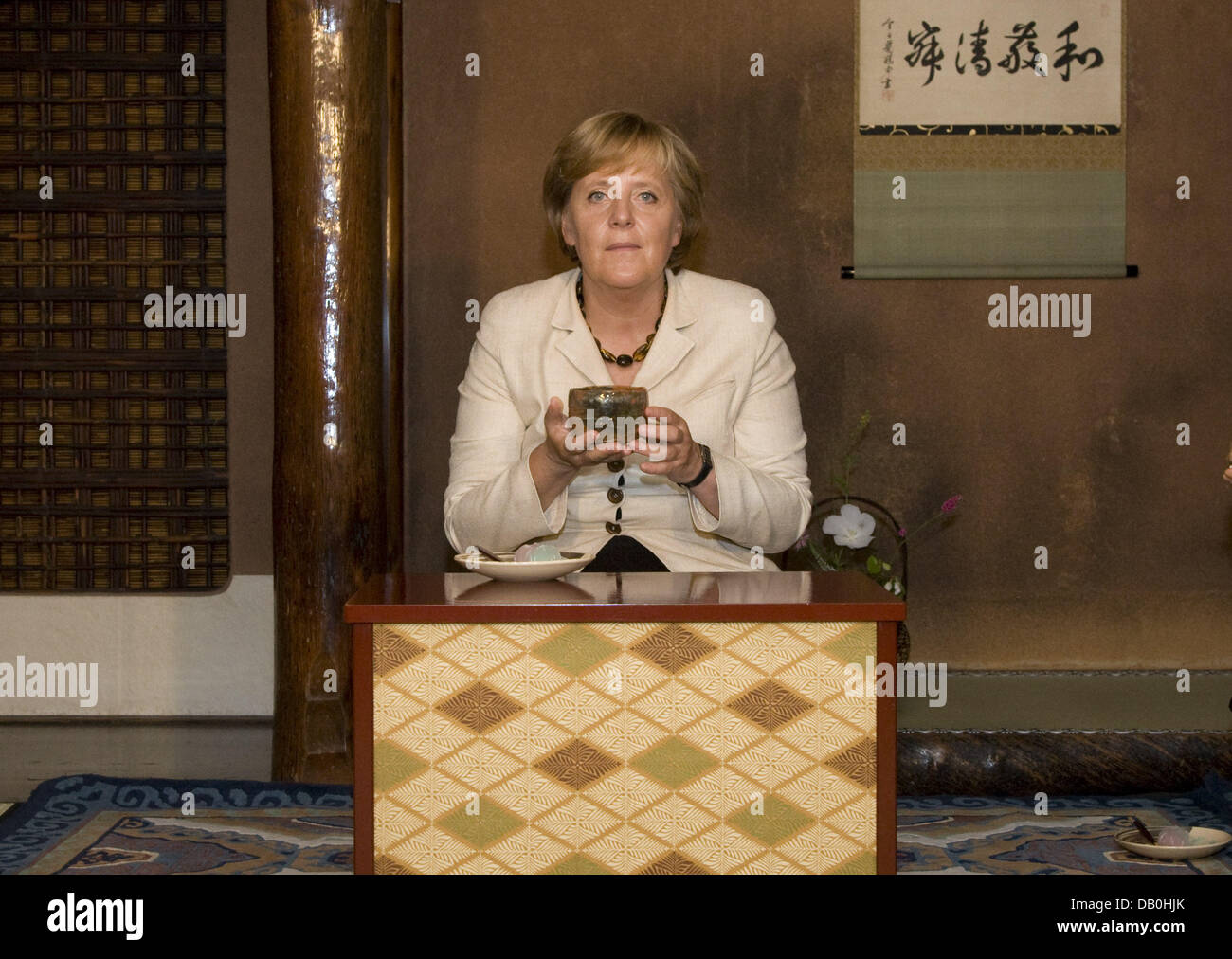 German Chancellor Angela Merkel visits a tea school in Kyoto, Japan, 31 ...