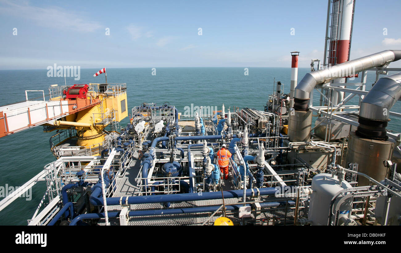 An employee of energy company Wintershall works on offshore platform L8 ...