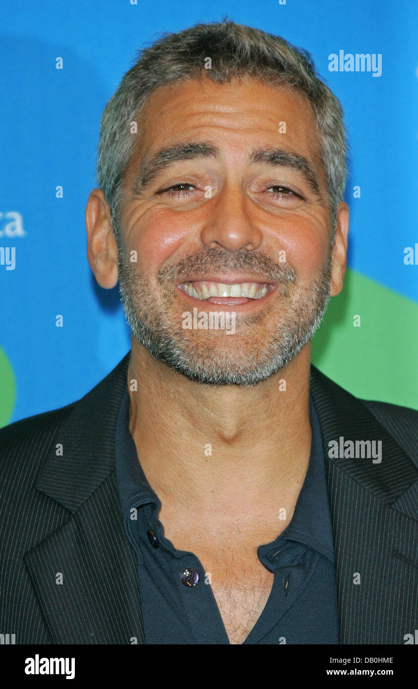US-American actor George Clooney poses after the press conference of ...