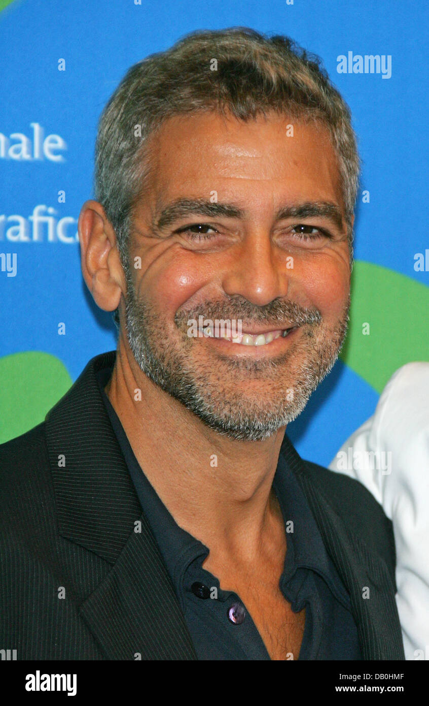 US-American actor George Clooney poses after the press conference of ...