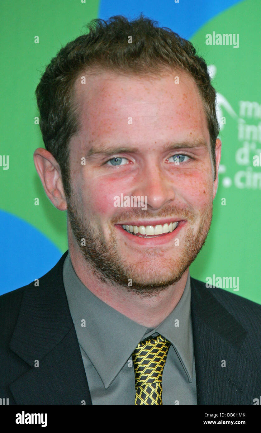 Actor Patrick Carroll poses after the press conference of his film ...