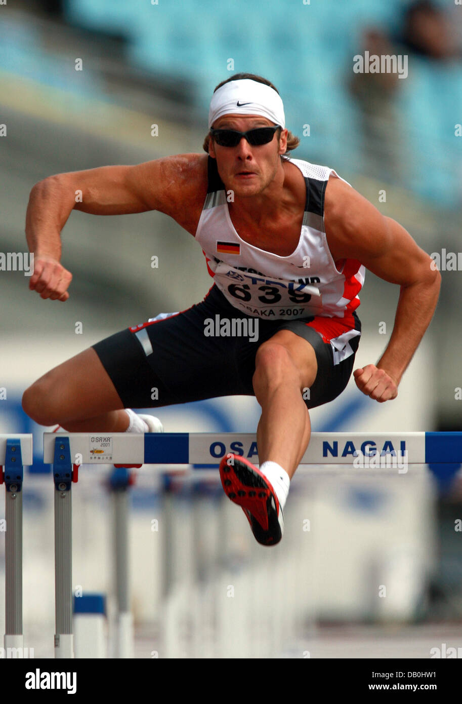 German Andre Niklaus overcomes a hurdle in the Decathlon 110m Hurdles ...