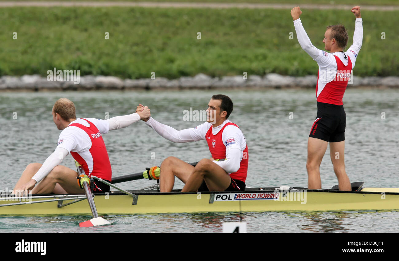 Gold medalists (R-L) Daniel Trojanowski, Lukasz Kardas and Dawid Paczes cheerwinning in the 2007 ...