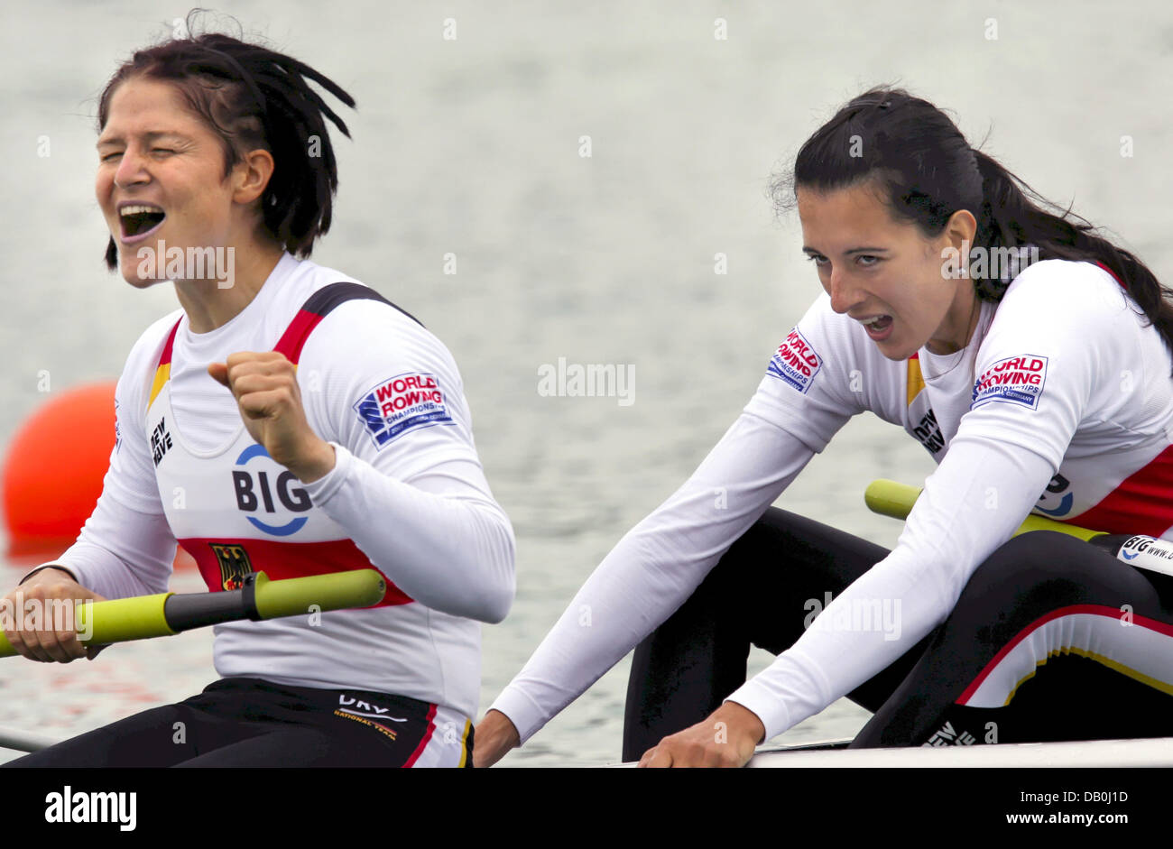 Silver medalists Elke Hipler (L) and Nicole Zimmermann of Germany cheer ...