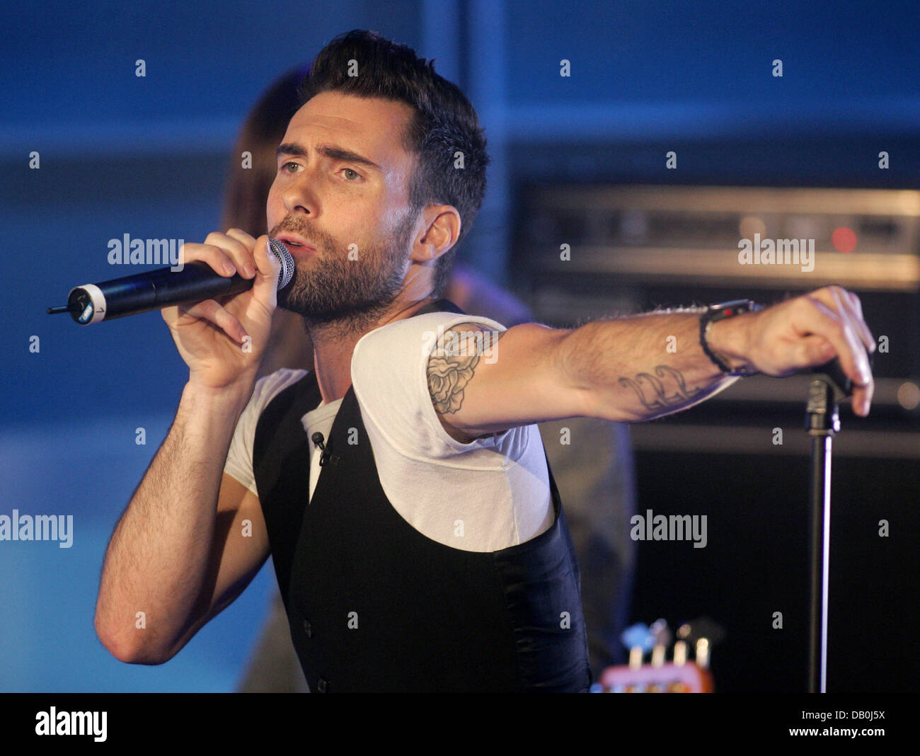Adam Levine and his band Maroon 5 perform at the German TV show ...