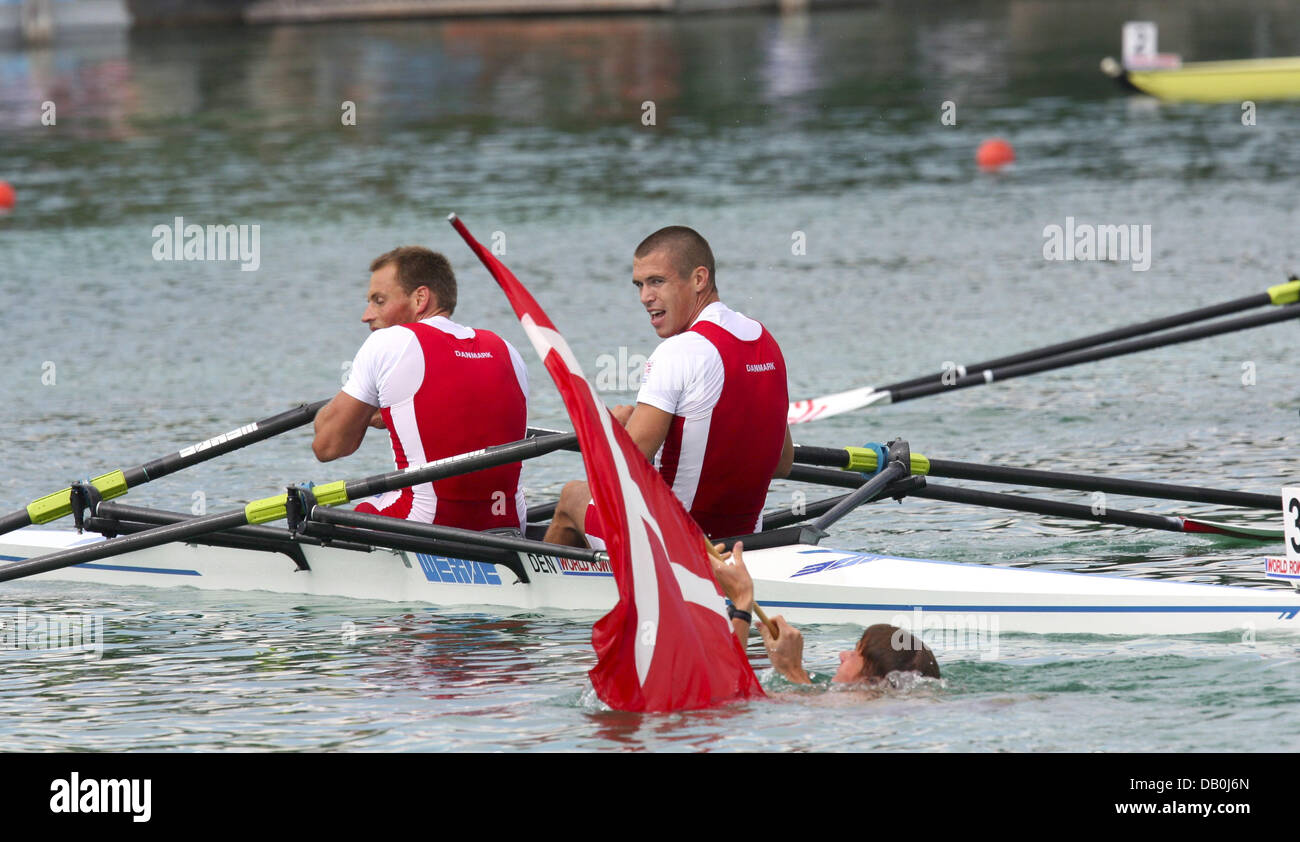 Mads Rasmussen (C) and Rasmus Quist (L) of Denmark cheer winning at the ...