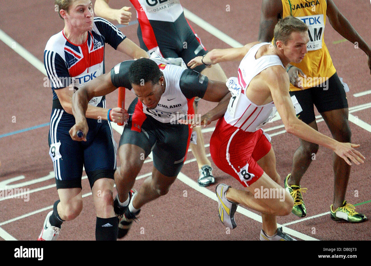 Kamghe Kaba (C) of Germany and Polish Daniel Dabrowski and Ingo Schultz ...