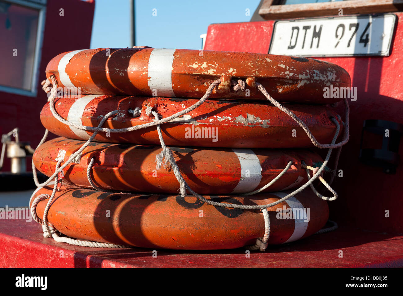 Lifebuoys on a ship in the harbour, Arniston, South Africa Stock Photo ...