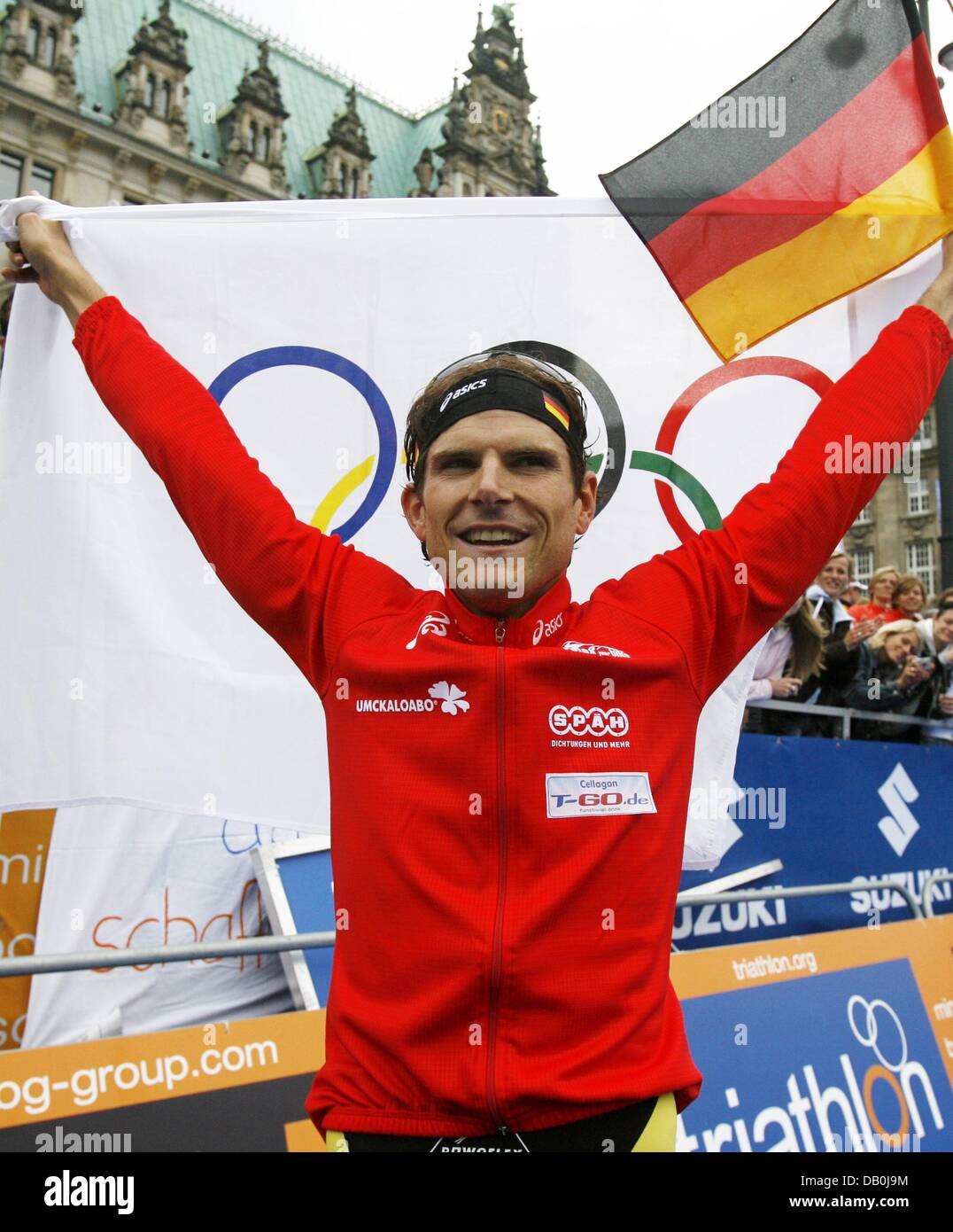 German Daniel Unger cheers winning the Hamburg Triathlon World ...