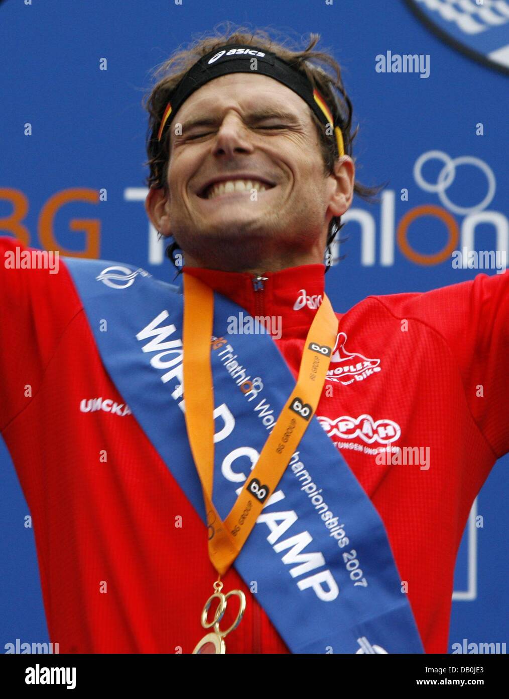 German winner Daniel Unger cheers after the Hamburg Triathlon World ...