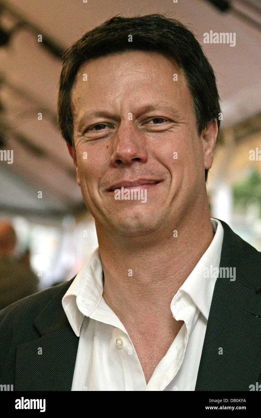 Director Gavin Hood poses at the world premiere of the movie 'Rendition ...