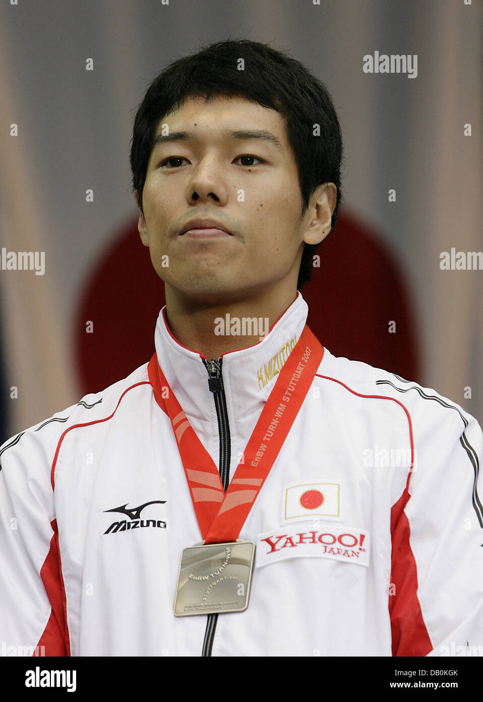 Chinese gymnast Wei Yang jubilates with his medal around the neck after ...