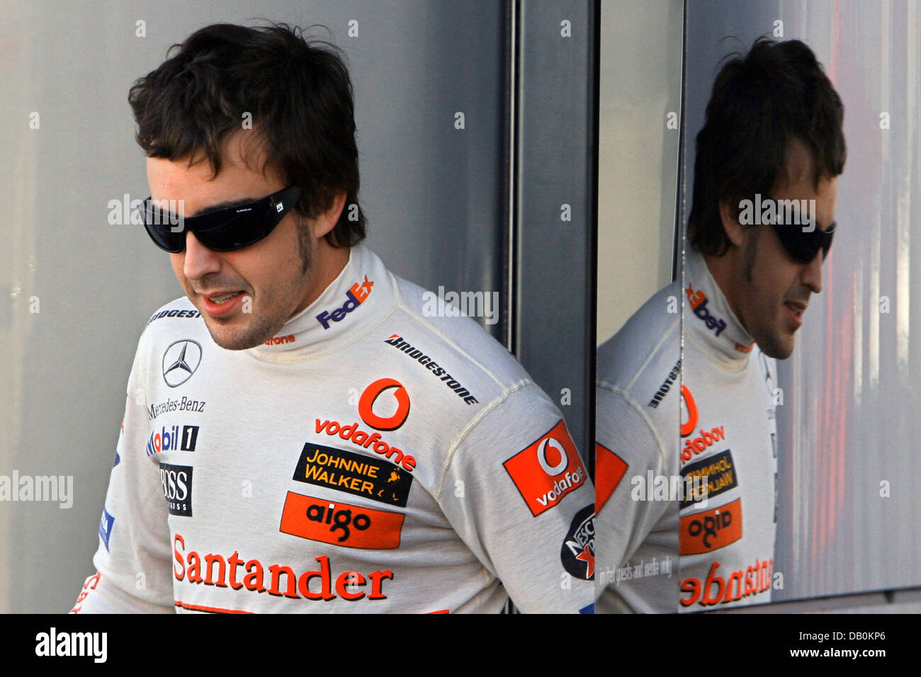 Spanish Formula One driver Fernando Alonso of McLaren Mercedes walks in ...