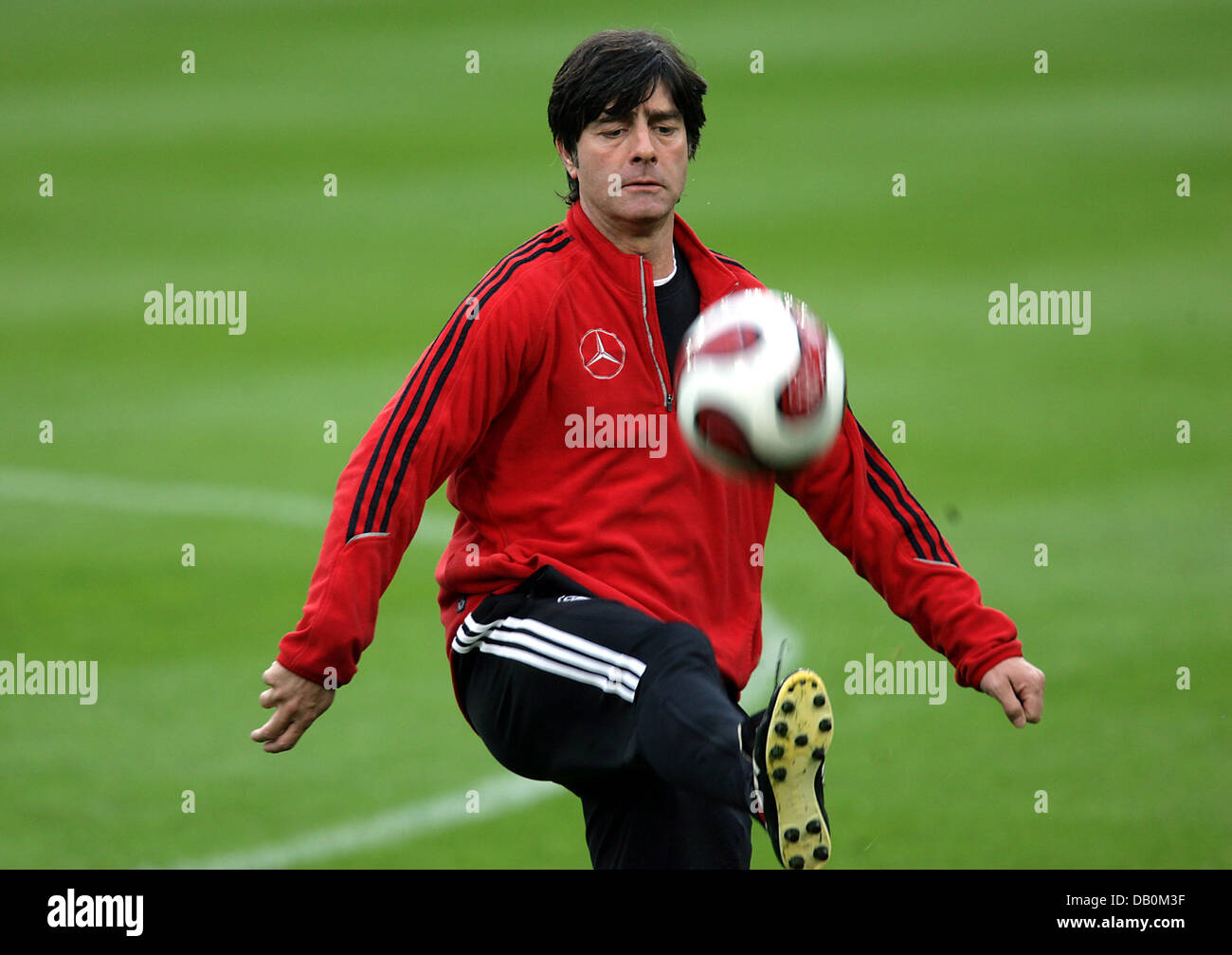 The head coach of Germany's national soccer team, Joachim Loew, plays ...