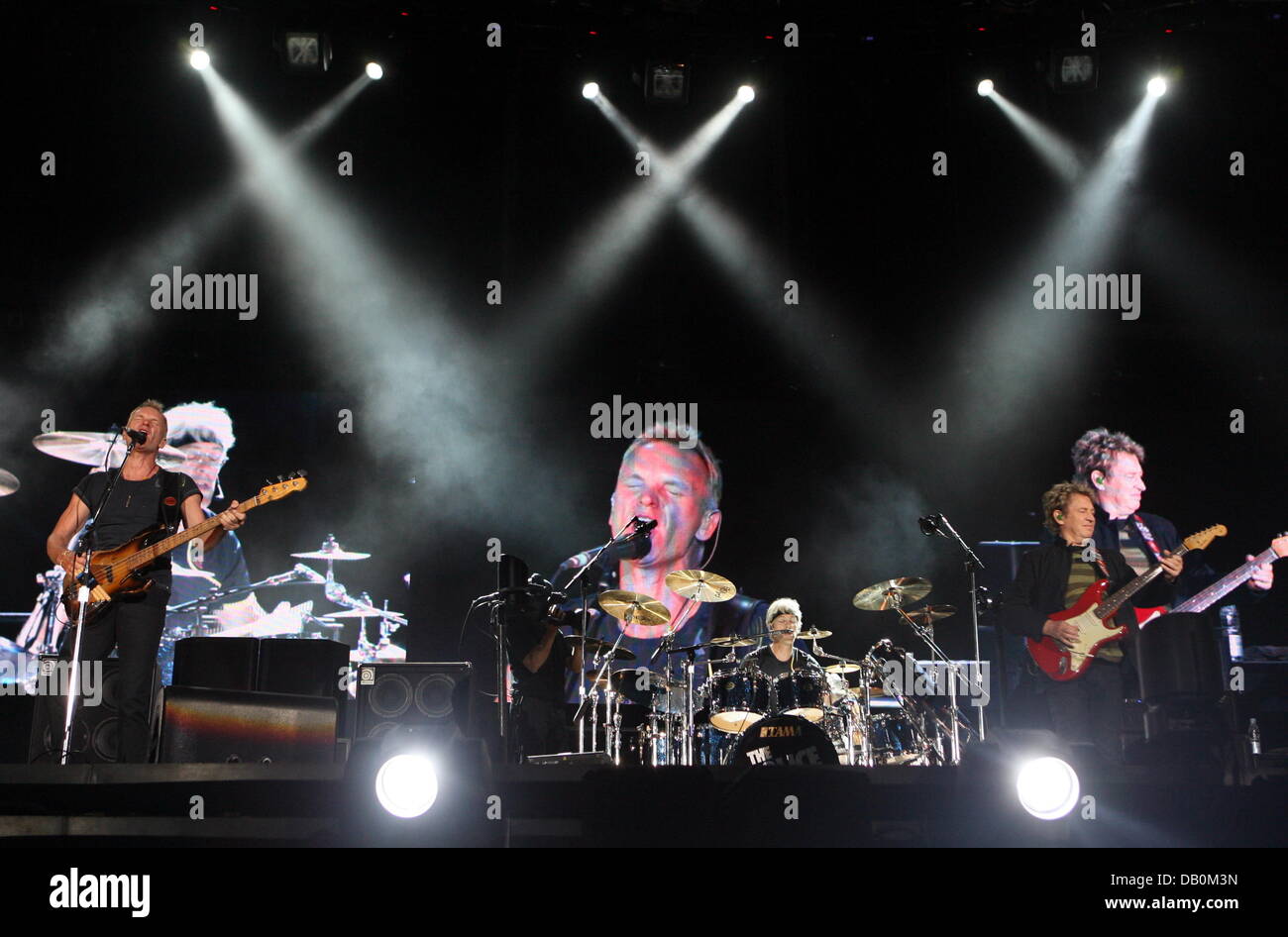 Singer Sting (L) of the rock band 'The Police' performs alongside ...