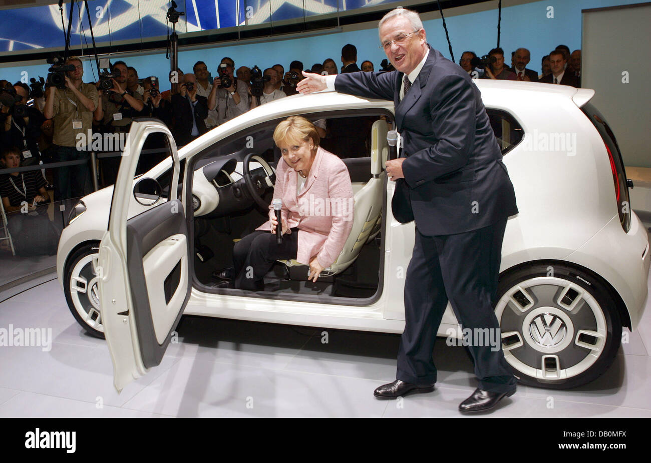 German Chancellor Angela Merkel (L) and VW CEO Martin Winterkorn pose ...