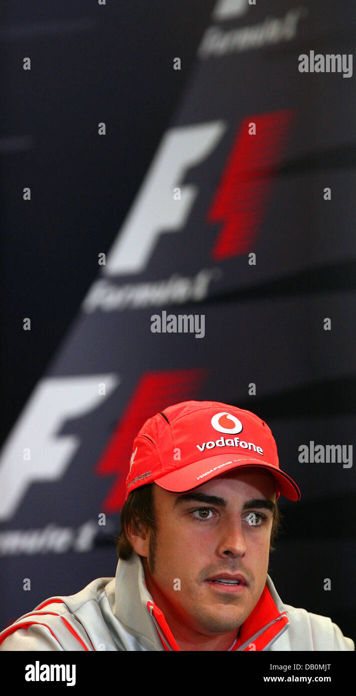 Spanish Formula One driver Fernando Alonso of McLaren Mercedes listens ...
