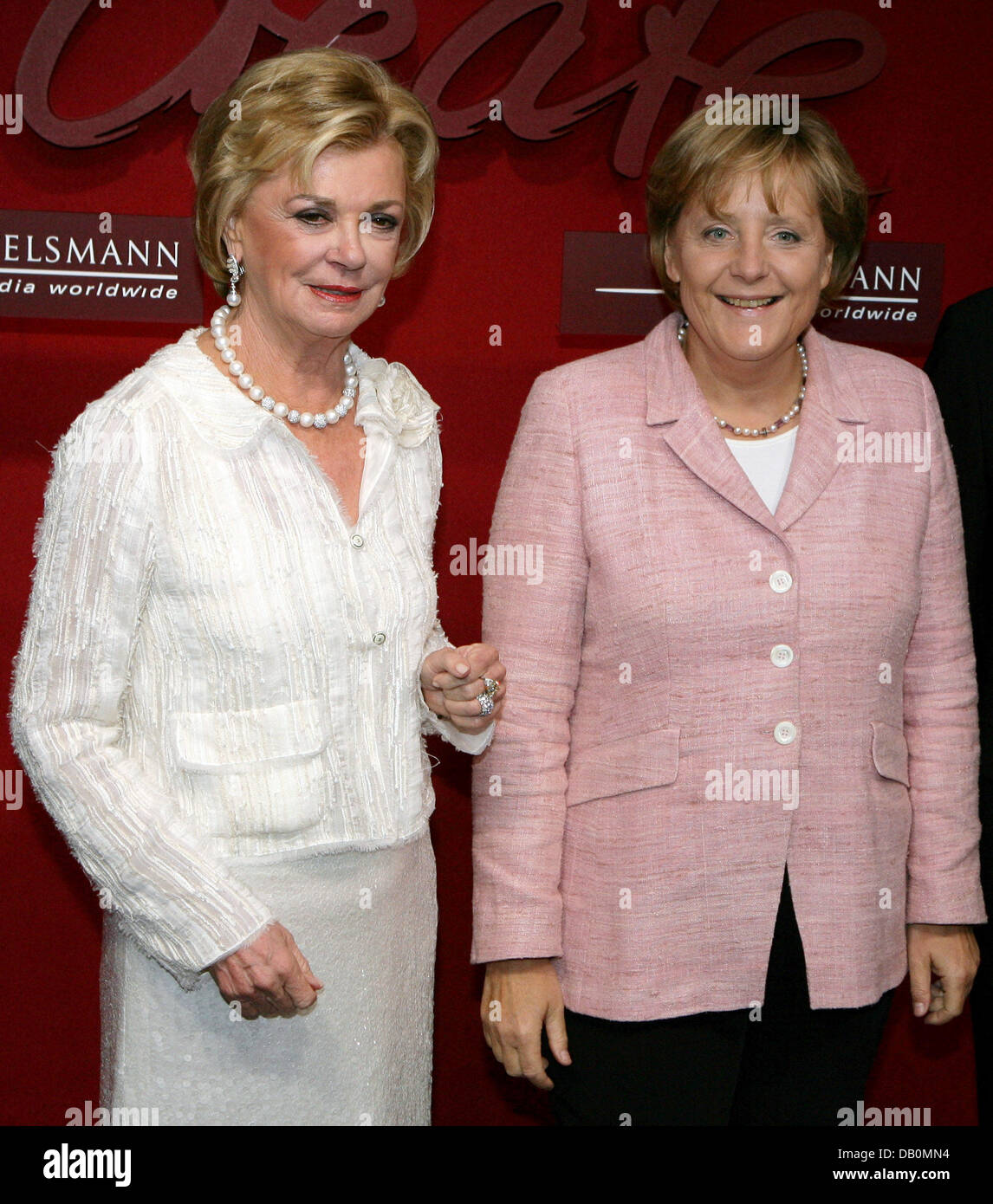 Vice-chair of Bertelsmann Foundation Liz Mohn (L) and German Chancellor ...
