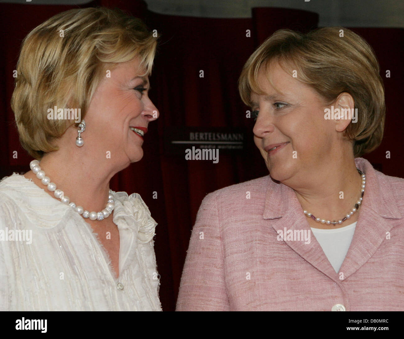 Vice-chair of Bertelsmann Foundation Liz Mohn (L) and German Chancellor ...