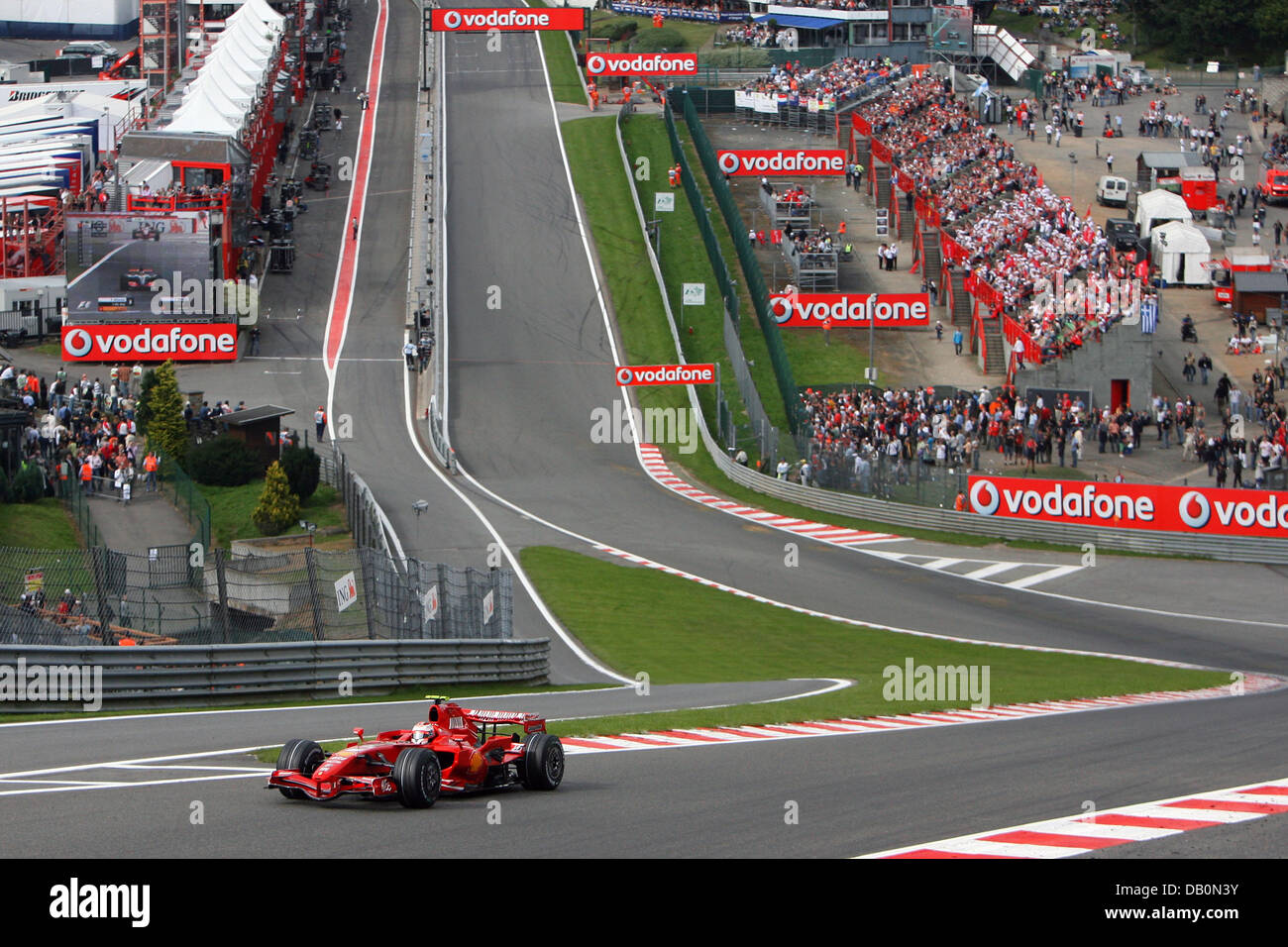 Finnish Formula One pilot Kimi Raikkonen of Ferrari steers his car ...