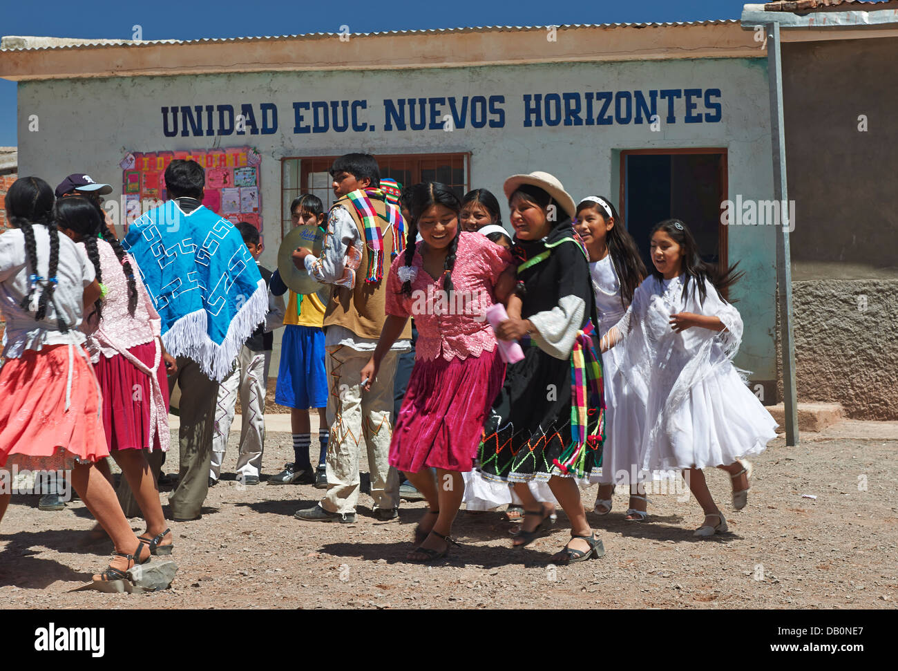 dancing indigenous Quechua children in village near San Antonio de ...