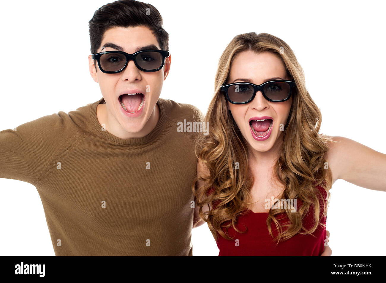 Excited boy and girl cheering loudly Stock Photo - Alamy