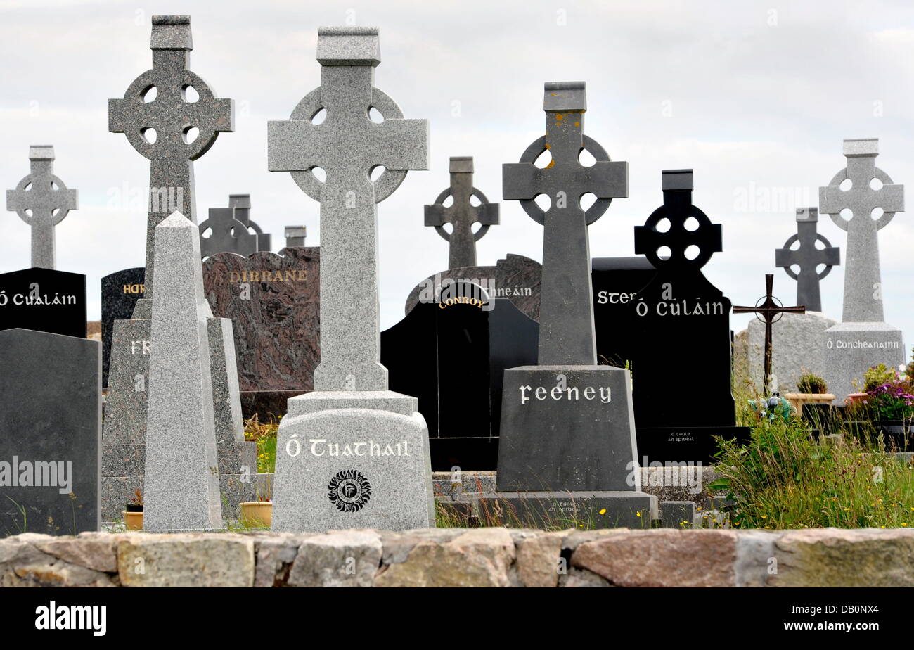 Typical irish crosses with irish-gaelic inscriptions are standing on ...