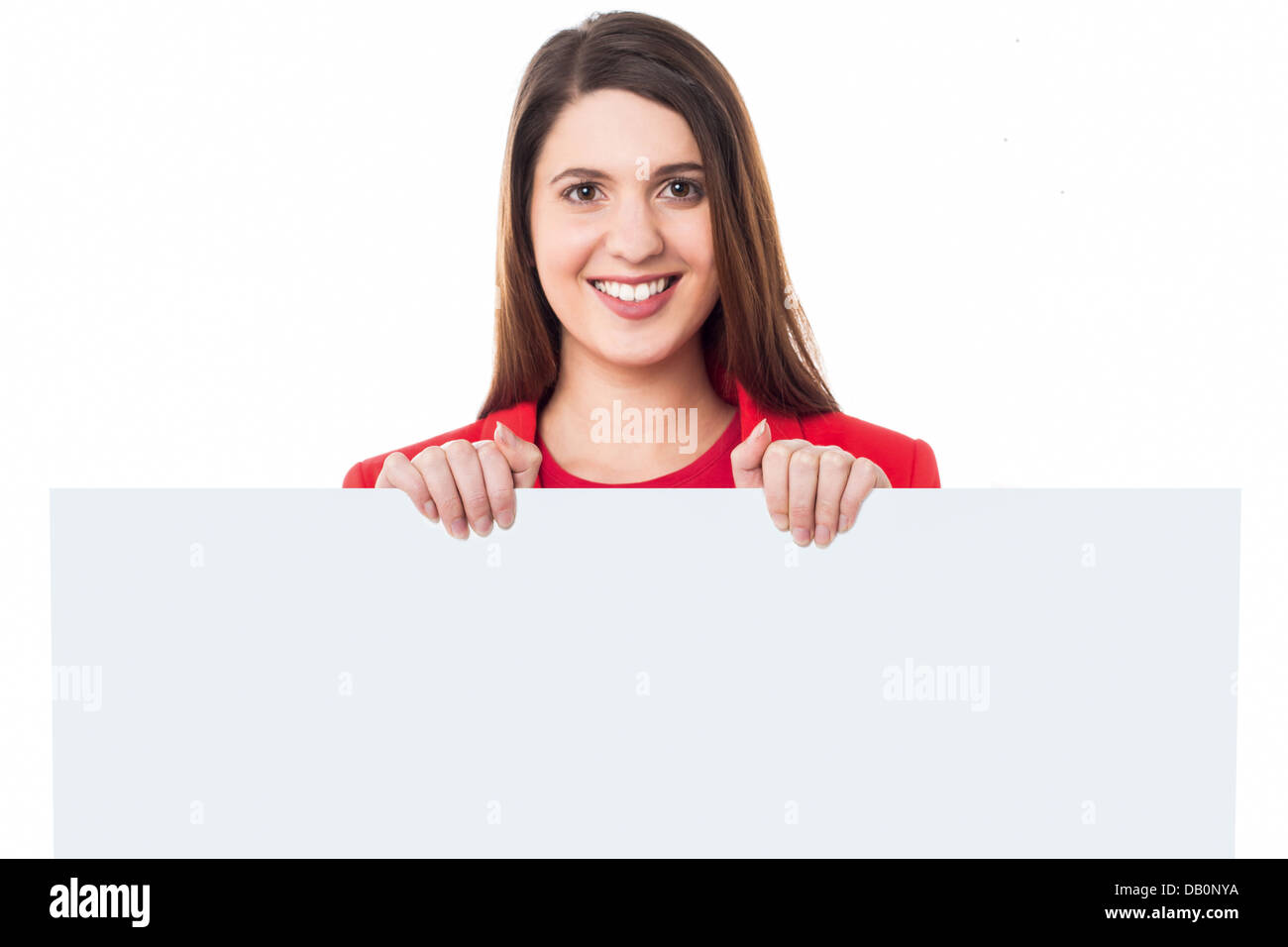 Pretty young girl standing behind banner ad Stock Photo - Alamy