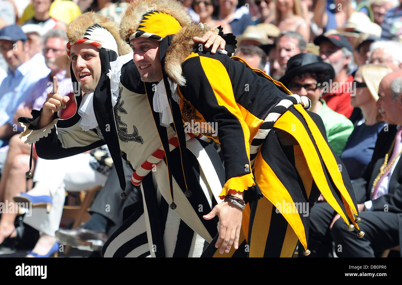 Dancers in historical costumes perform the fisher dance in Ulm, Germany ...