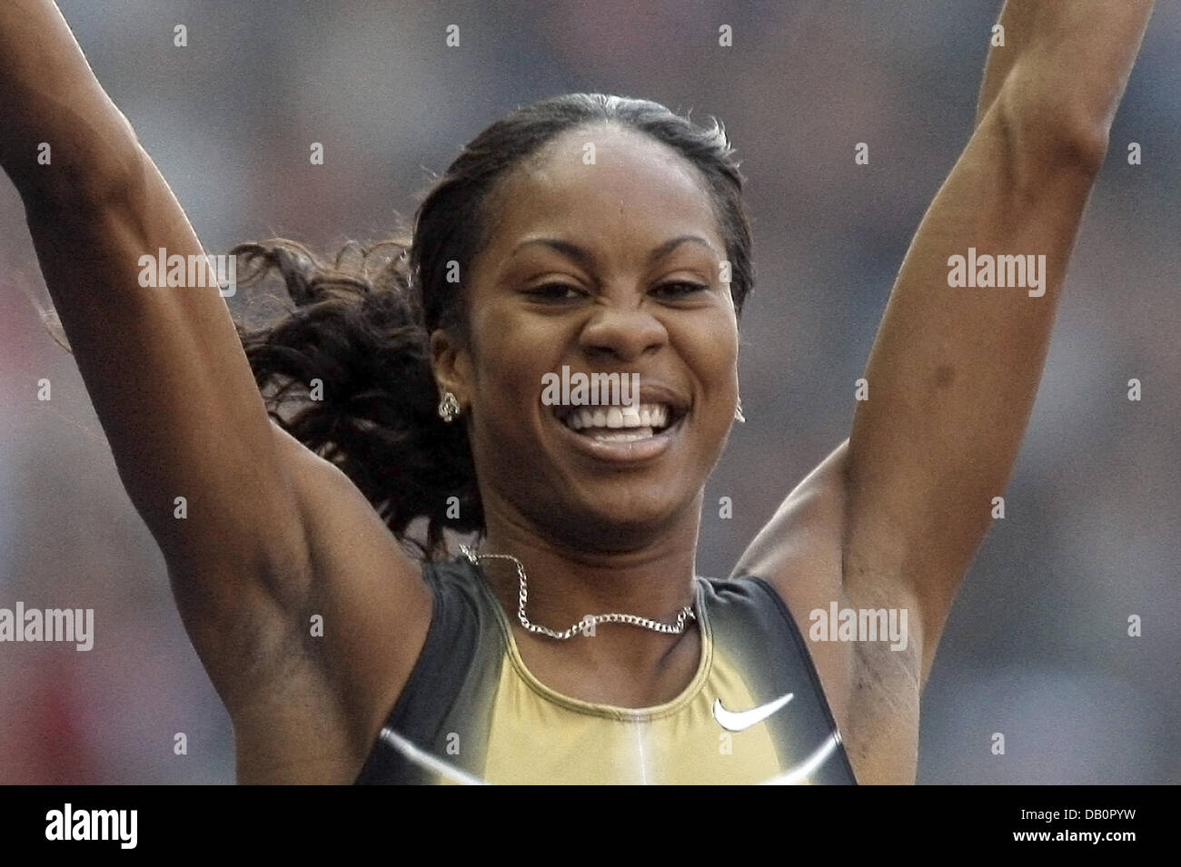 US-American athlete Sanya Richards cheers as she wins the 400m running ...
