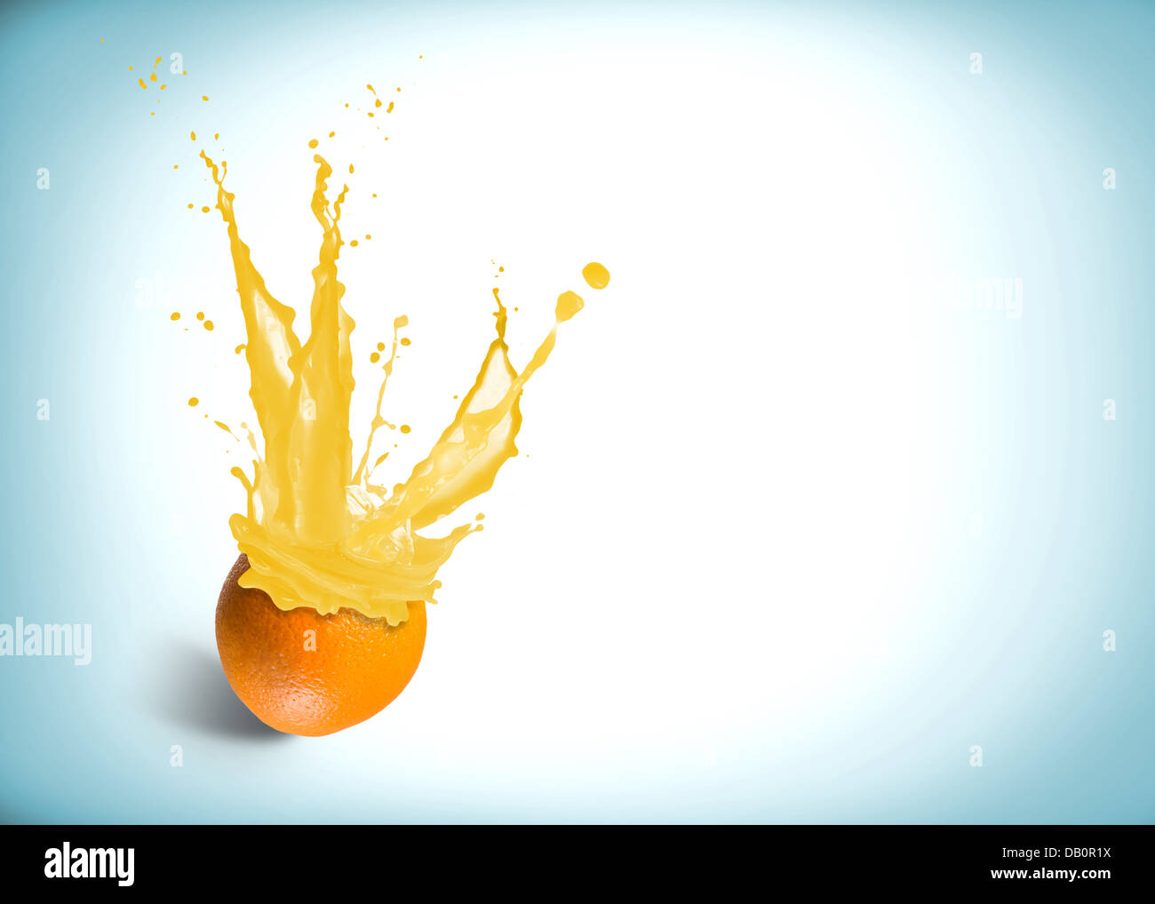 fresh orange juice with a splash Stock Photo - Alamy