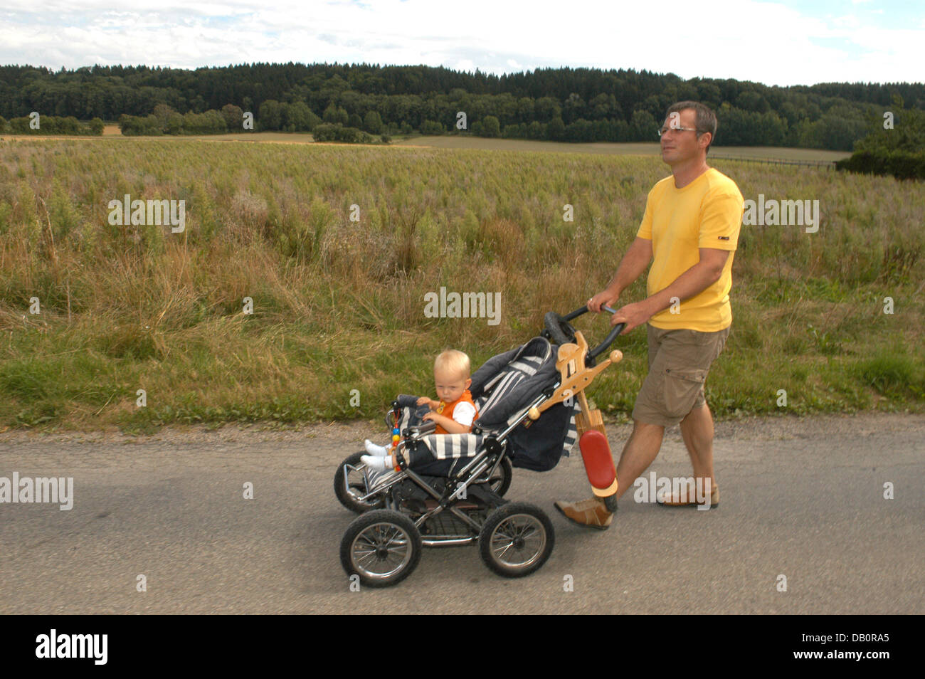 Peter Ott pushed the pram with his son Lukas during a walk near ...