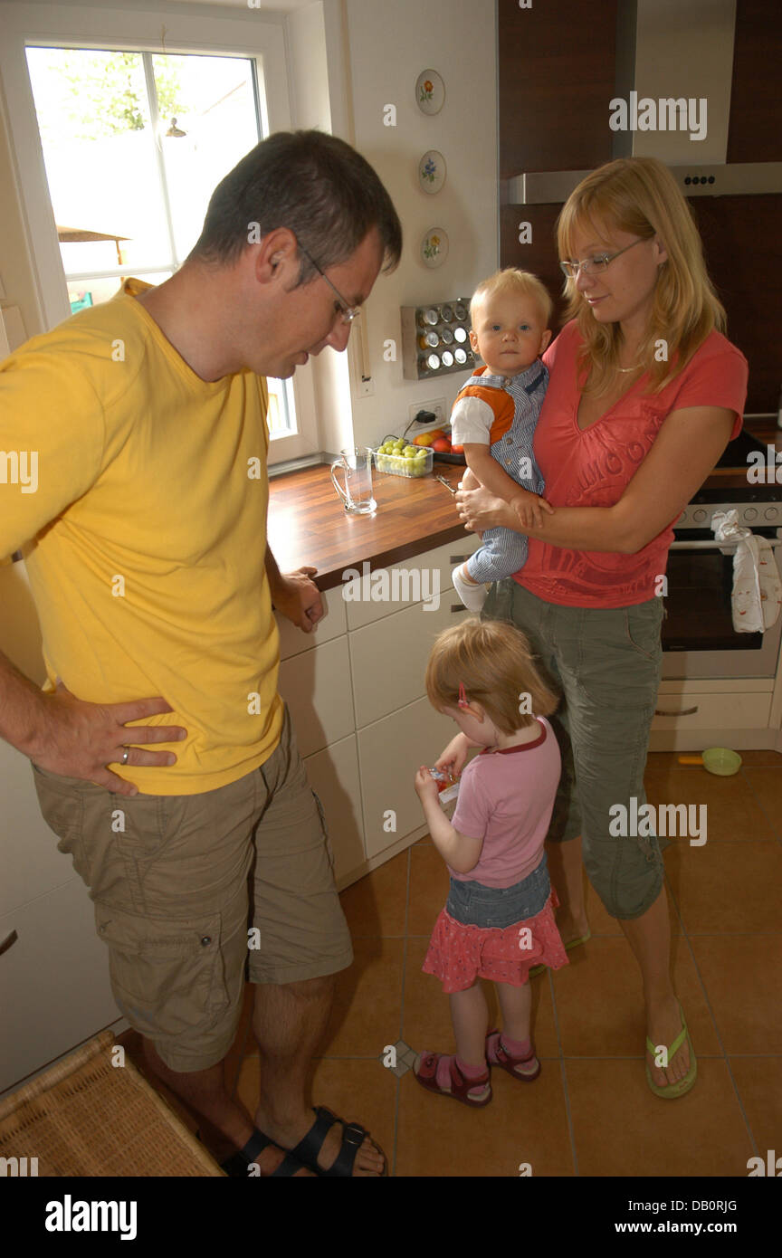 Peter Ott and his wife Veronika are pictured with their children Annika ...