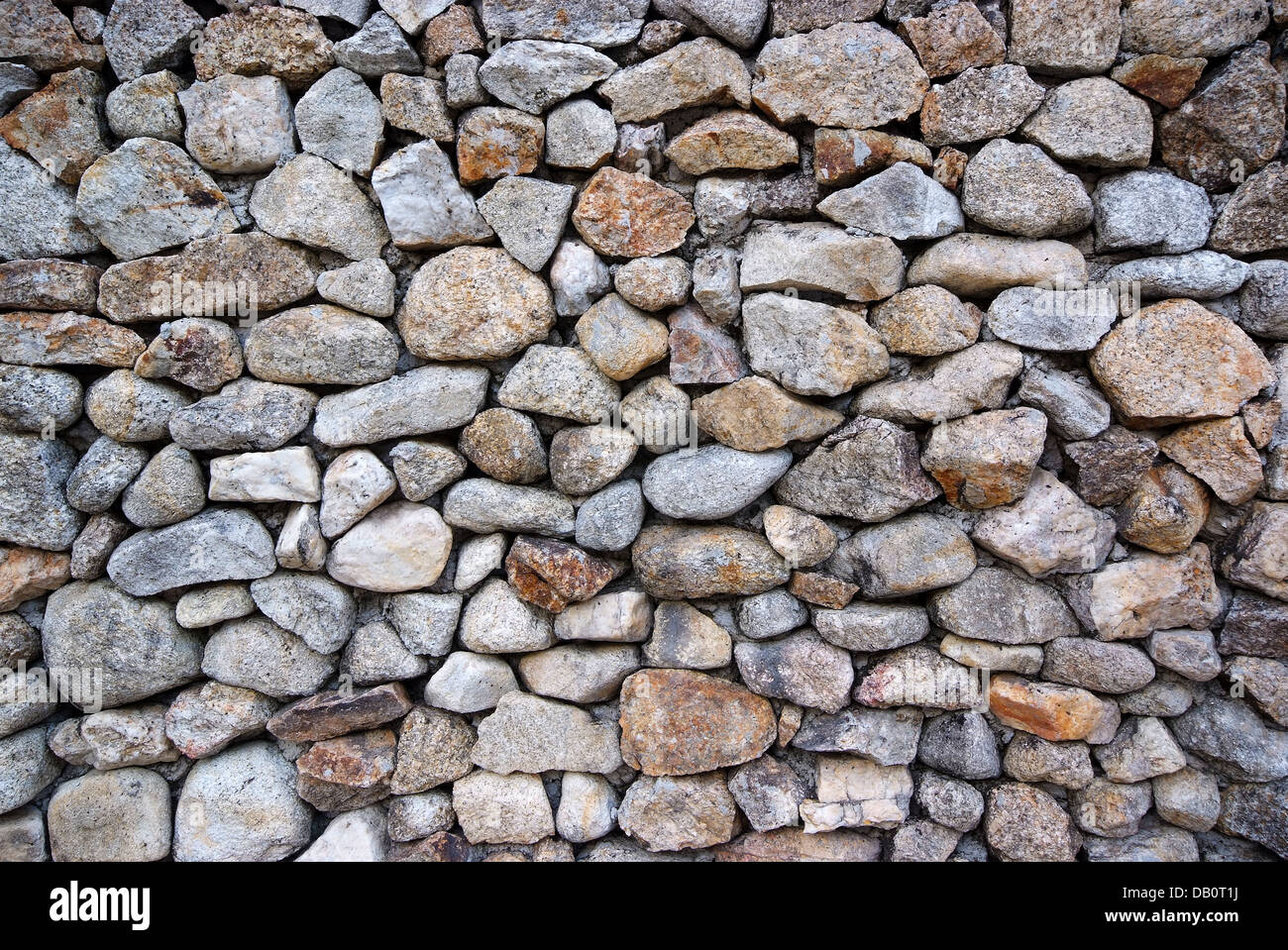 Background and texture of stone wall Stock Photo - Alamy